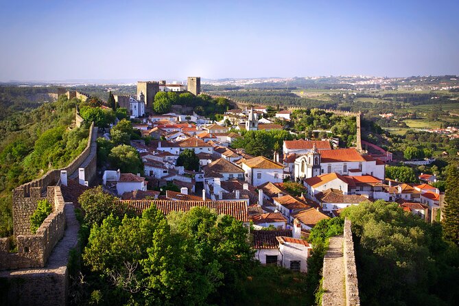 Transfer Tour Porto/Lisbon with 2 stops options Óbidos, Nazaré, Fátima, Coimbra - An Overview of the Private Transfer from Porto to Lisbon