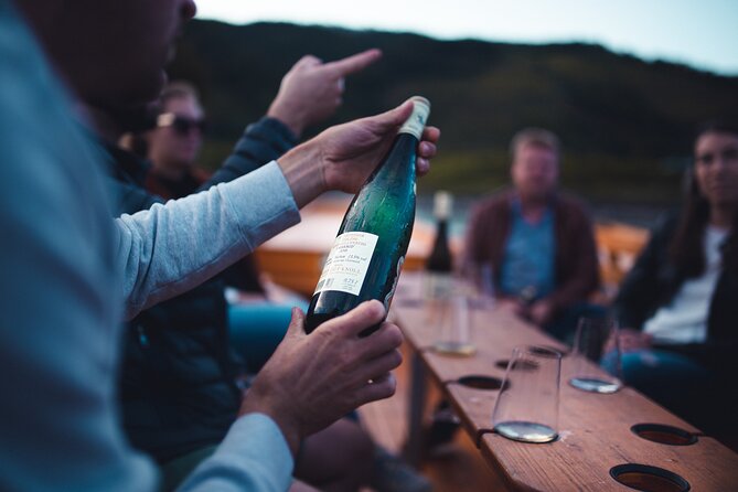 Wine tasting on traditional wooden boats in Wachau Valley - Authenticity and Value