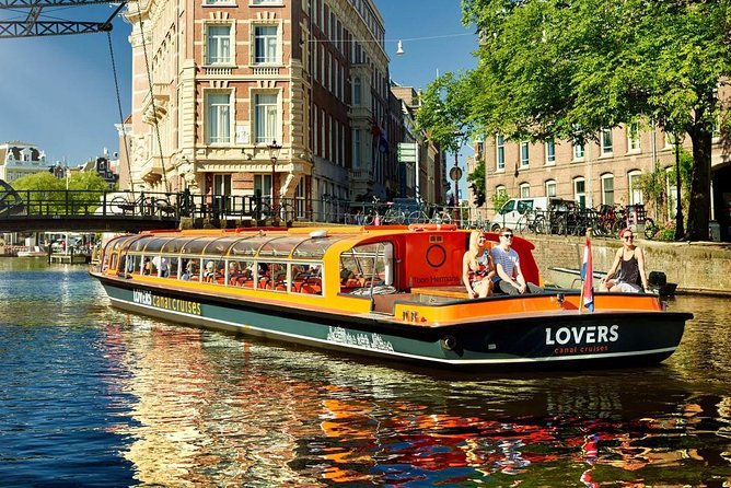 Amsterdam Layover: Walking Tour & Canal Cruise + Airport Transfer - Detailed Breakdown of the Itinerary