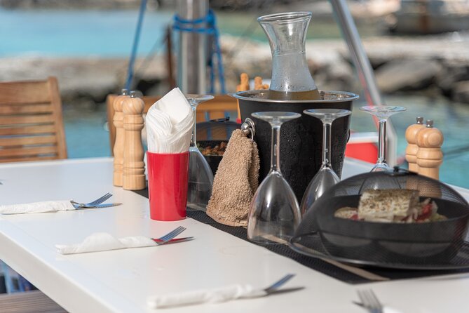 Hersonissos: Sunset Catamaran Cruise with Snacks and Drinks - Frequently Asked Questions
