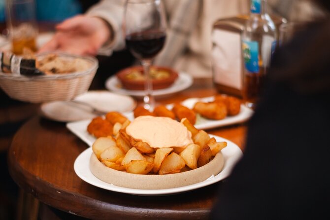 Marbella Old Town: Authentic Tapas Food Tour With Local Guide - Exploring Marbella’s Historic Walls and Plaza de Los Naranjos