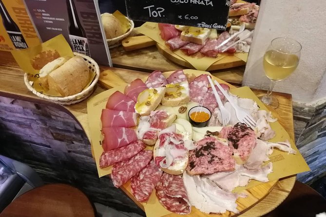 Pisas Ultimate Food Tour: Full Tuscan Meal by Do Eat Better - Exploring Local Dishes at a Lively Eatery