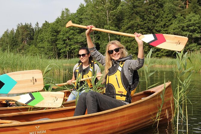 Premium guided Canoe Tour in lake Plateliai Handcrafted inventory and picnic set - The Sum Up