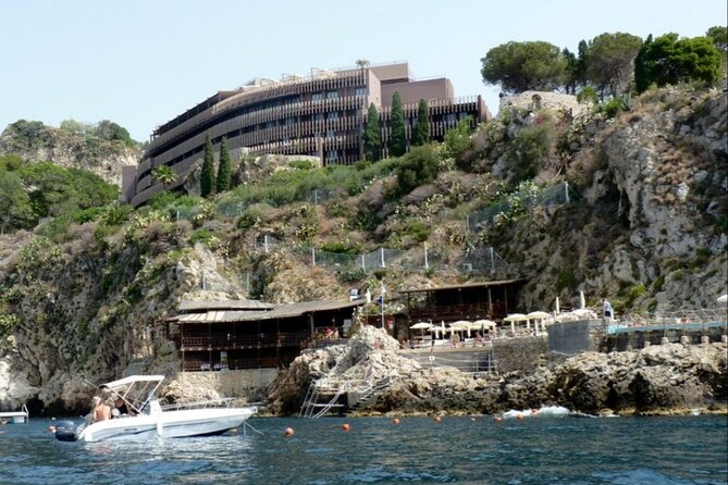 Private boat tour Giardini Naxos Taormina with platter and wine - Onboard Experience: Food, Drinks, and Atmosphere