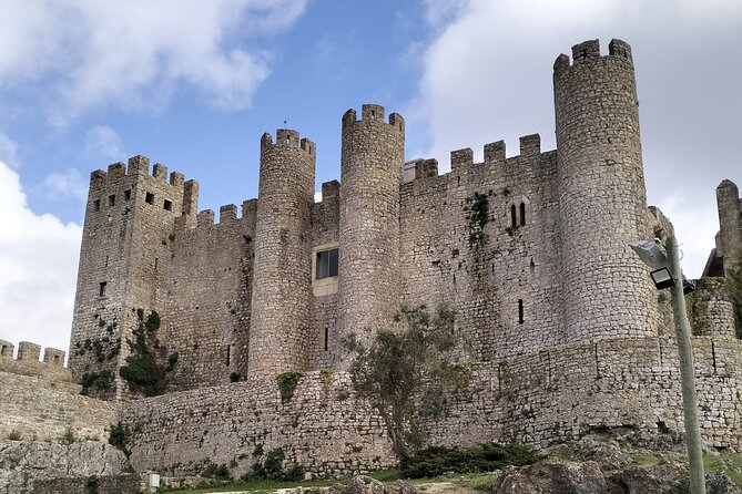Private Transfer Porto to Lisbon with Nazaré and Óbidos Stops - High-Altitude Views at "O Sítio"