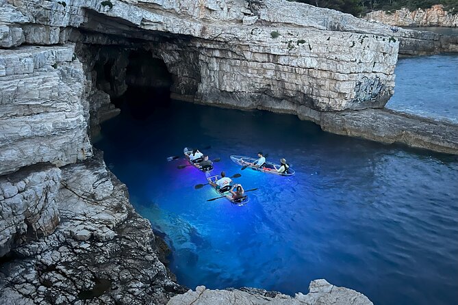 Pula: Sunset/Night-time Illuminated Transparent Kayak Cave Tour - The Flow of the Experience