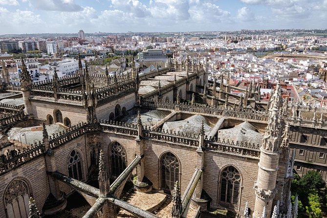 Seville Cathedral Guided Tour with Priority Access. - Climbing the Giralda: Panoramic Views of Seville