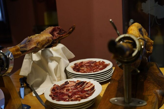 3 Hours Malaga Tapas Crawl Tour by Food Lover Tour - Atmosphere and Neighborhoods