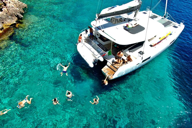 Catamaran in Alghero, daily boat trip - The Authenticity and Personal Touch