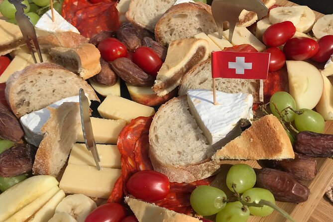 Cheese platter by Boat on Lake Thun, Interlaken - Authenticity and Cultural Touches