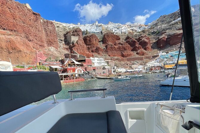 Half Day Premium Catamaran Cruise in Santorini including Oia - Who Should Consider This Tour?
