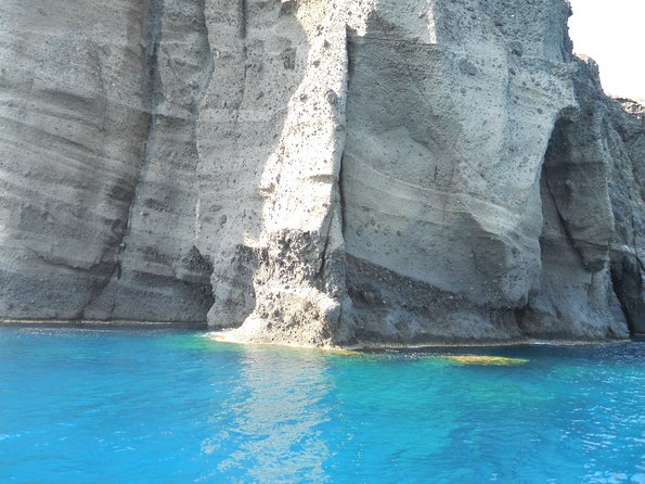 Santorini Luxury Catamaran Sunset Cruise with BBQ, Drink and Transfer - Who Should Consider This Tour?