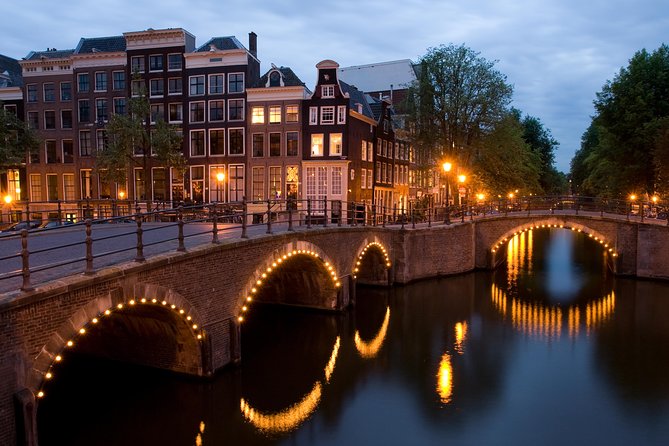 Amsterdam Layover: Walking Tour & Canal Cruise + Airport Transfer - The Sum Up