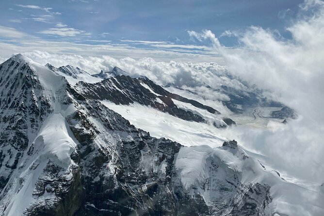 Private Swiss Alps helicopter tour over snow covered mountain peaks and glaciers - Who Should Consider This Tour?
