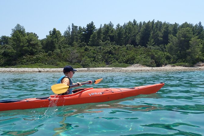 Lumbarda-Sunset Kayaking Experience with picnic: Wine and Sweets - The Sum Up