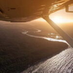 Airplane flight over Riga or Latvia - The Itinerary: Making the Most of Your Flight