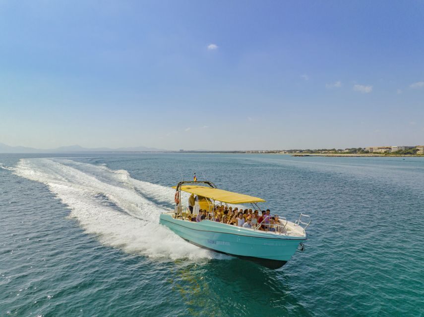 Alcudia: Coll Baix Beach & Sea Caves Cruise with Snorkeling - Embarking on the Boat