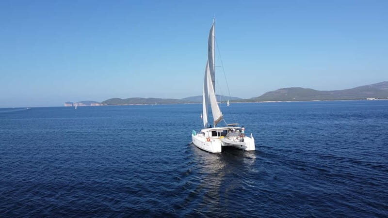 Alghero: Sailing catamaran day trip with lunch - The Highlights: Why Travelers Love This Tour