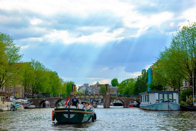 Amsterdam: 90 min Kings Day Boat Party with Unlimited Drinks - Key Points