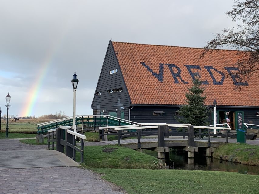 Amsterdam: Countryside Bike Tour and Zaanse Schans Windmills - Windmills and Historical Insight
