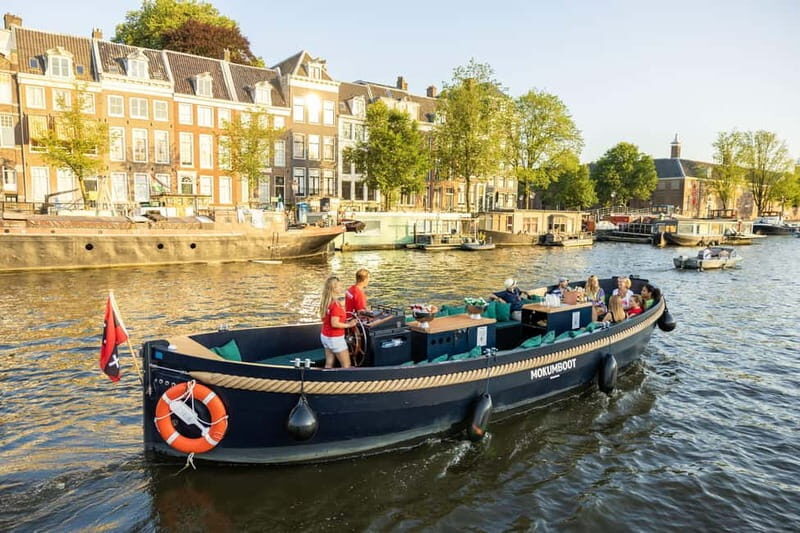 Amsterdam: Guided Open Boat Canal Cruise Including Drink - What to Expect from the Tour