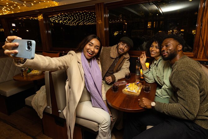 Amsterdam Light Festival: Canal Cruise Covered Saloon Boat - Key Points