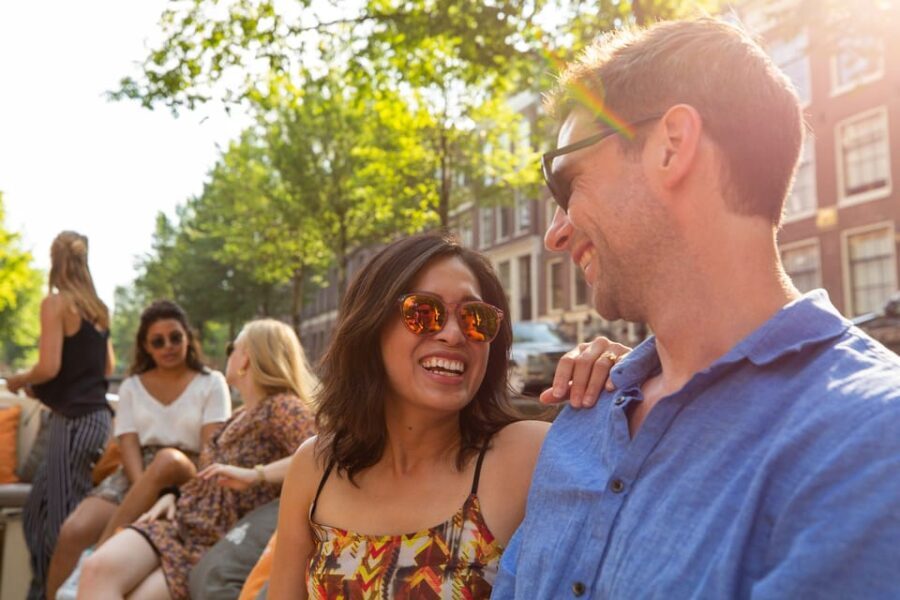 Amsterdam: Private Canal Cruise in German + Unlimited Drinks - Navigating the Canal: What to Expect