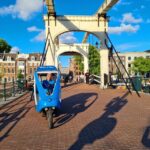 Amsterdam: Private Pedicab Historical Sightseeing Tour - Authentic Experiences Highlighted by Travelers