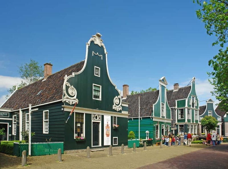 Amsterdam: Zaanse Schans windmills & Volendam Guided Tour - Zaanse Schans Windmills: Step Into a Living Museum