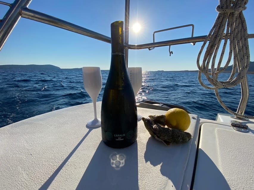 aperitifs at sunset on the Stintino catamaran burianaCharter - FAQs