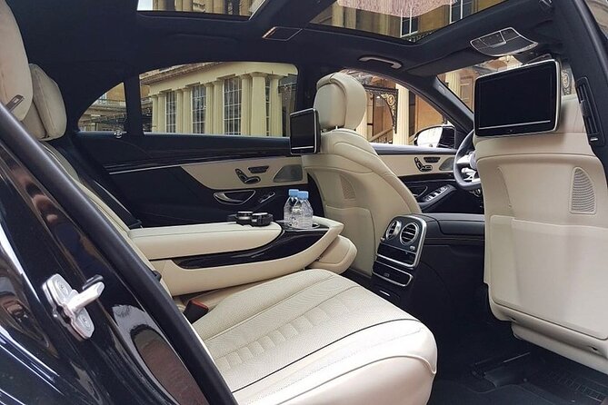 Arrival Transfer: Fiumicino Airport FCO to Rome by Luxury Car - Key Points