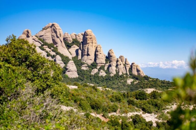 Barcelona: Sitges & Montserrat Monastery Tour with Easy Hike - Discovering Montserrat: More Than Just a Mountain