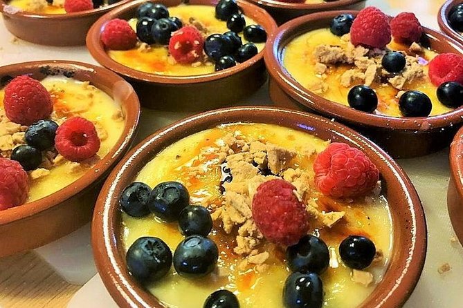 Boqueria Guided Market Tour and Paella Cooking Class - Exploring La Boqueria Market