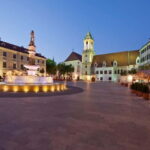 Bratislava: Guided Walking Tour at Night with Old Town - Walking Through the Old Town at Night