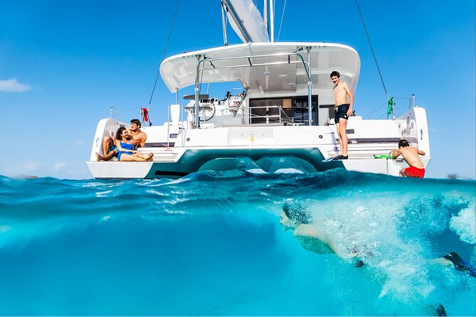 Catamaran Day & Sunset Cruises with meals Drinks and transportation - Key Points