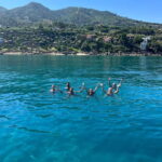 Catamaran tour along the Cefalù coast with aperitif and snorkeling - A Well-Balanced Coastal Cruise with a Touch of the Mediterranean