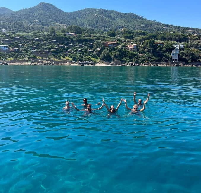 Catamaran tour along the Cefalù coast with aperitif and snorkeling - A Well-Balanced Coastal Cruise with a Touch of the Mediterranean