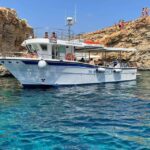 Comino: Private Boat Trips, Swimming stops and Caves Tours - The Sum Up