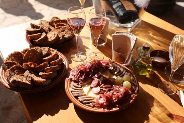 From Barcelona: Montserrat Lunch & Wine Tasting in Vineyard - Exploring Montserrat Monastery and Cultural Treasures