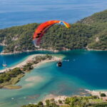 From Fethiye: Tandem Paragliding in Ölüdeniz - The Ascension: Reaching Mount Babadag