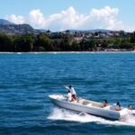 From Lazise: 4 hours boat tour cruise on Lake Garda - The Experience of Prosecco and Relaxation