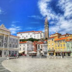 From Ljubljana: Postojna Cave, Predjama Castle, & Piran Tour - A Day of Balanced Exploration