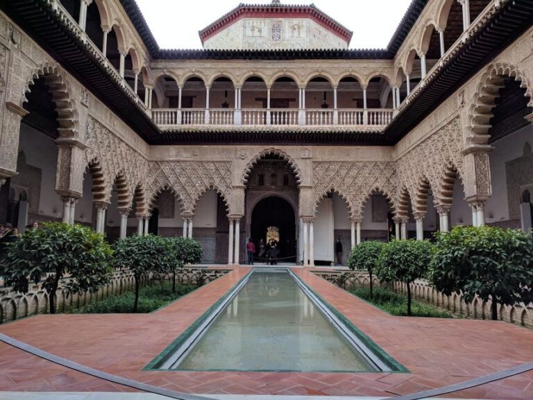 From Malaga: Seville Private Tour with Alcazar and Cathedral - Visiting the Royal Alcazar — A Moorish Masterpiece