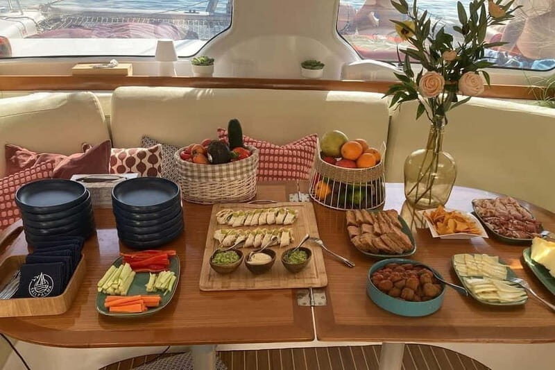 From Palma: Luxury Catamaran Group Tour with Tapas & Drinks - The Itinerary in Detail
