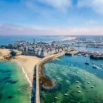 From Paris: 2-Day Normandy & Brittany Tour - Transportation, Timing, and Group Size