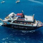 From Rhodes City: Boat Day Trip to Lindos - Discovering Lindos and Its Coastline