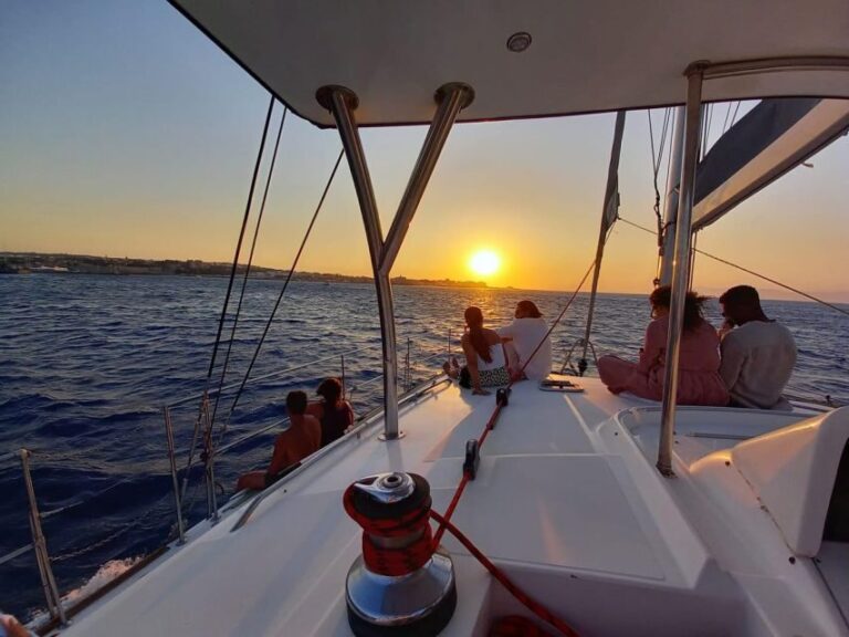 From Rhodes: Private Catamaran Sunset Cruise All Inclusive - What to Expect: Comfort, Cuisine, and Spectacle