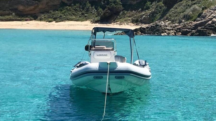 From Santa Teresa Gallura: dinghy tour to Corsica - Cruising Past Majestic Cliffs to Isola Piana