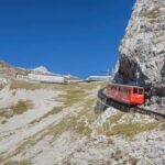 From Zürich:Small Group Tour Golden Roundtrip to Mt. Pilatus - Riding the Cogwheel Railway: A Steep Ascent with Panoramic Rewards