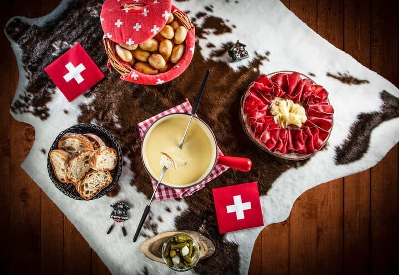 Geneva: City Tour and Fondue Cooking Class, Swiss Folklore - Transportation and Group Size: Why They Matter